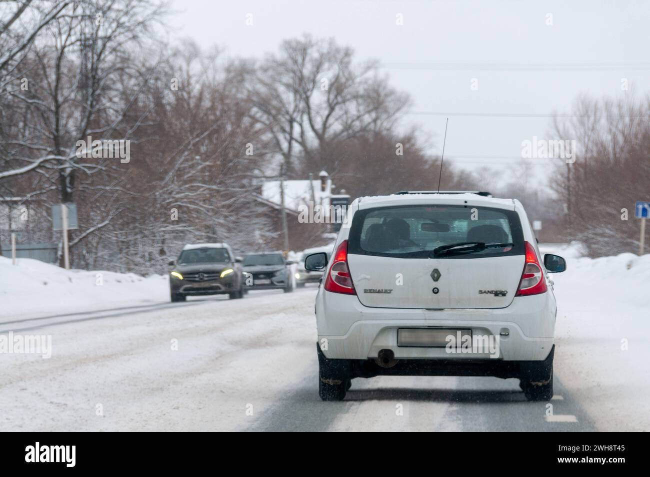 Consequences of snowfall A country track after a heavy snowfall Samara ...