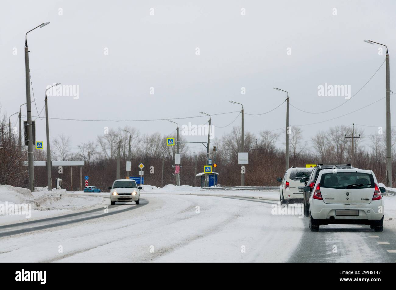 Consequences of snowfall A country track after a heavy snowfall Samara ...