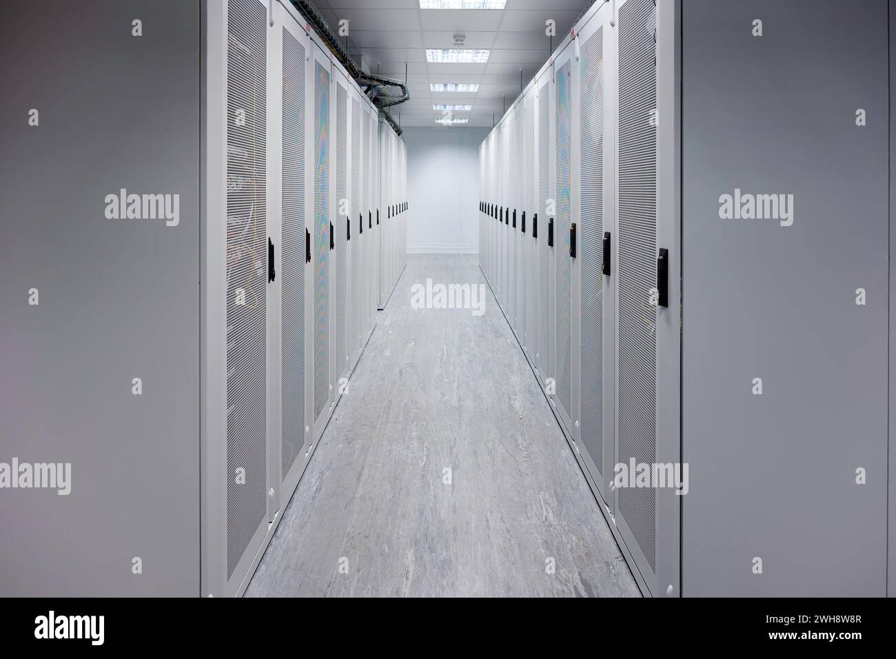 Row of server cabinets in a data centre Stock Photo - Alamy