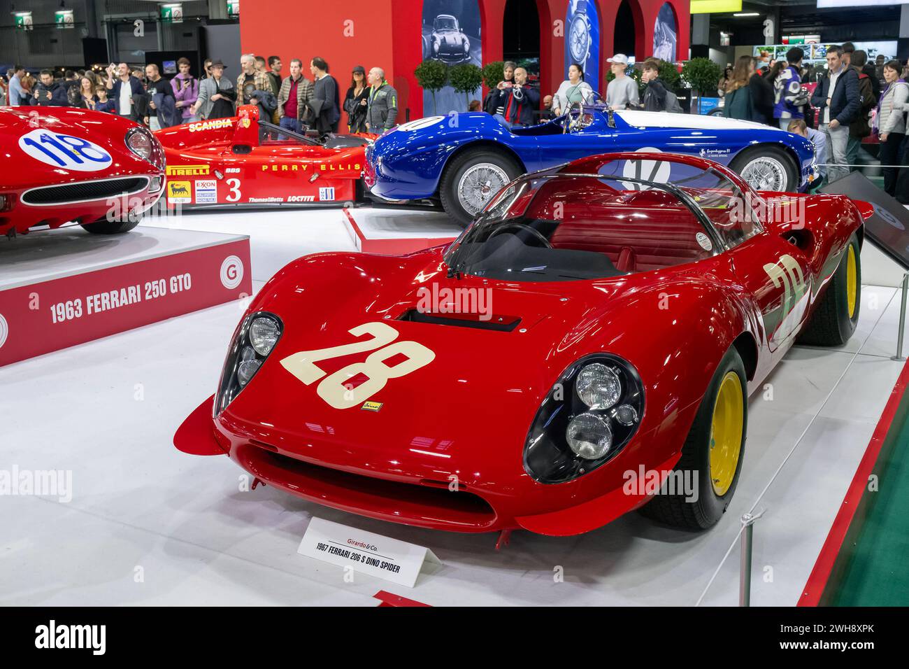 Paris, France - Rétromobile 2024. Focus on a red 1967 Ferrari 206 S ...