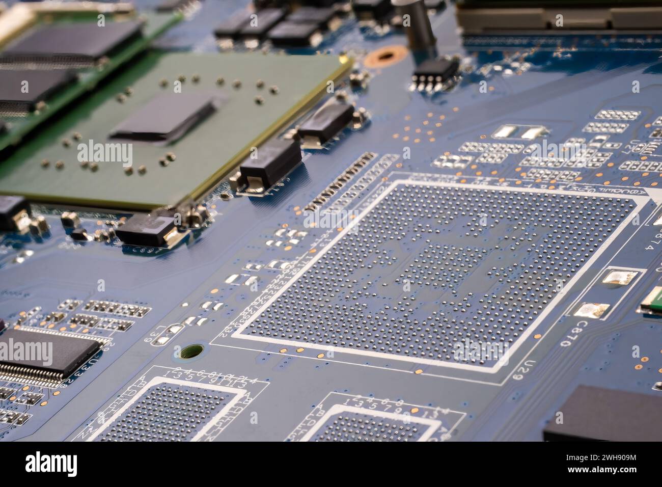 A close up of a computer motherboard with a cpu port on it Stock Photo ...