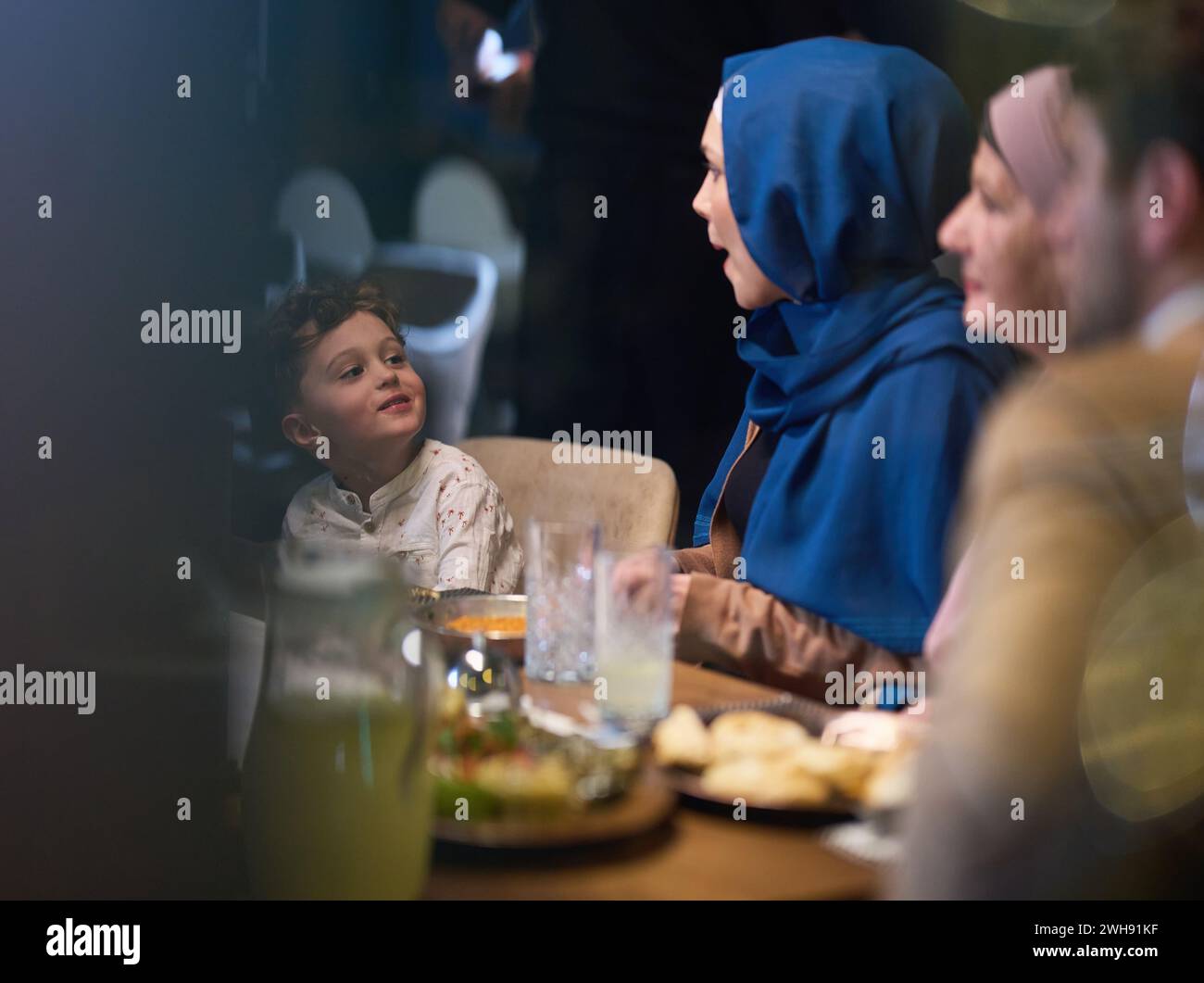 In a heartwarming scene, a professional chef serves an European Muslim ...