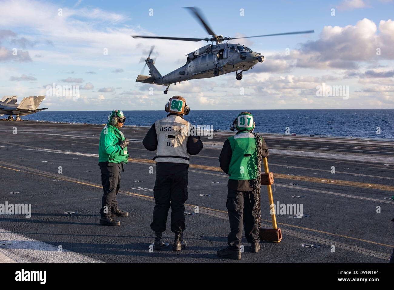 240206-N-LM220-2285 PACIFIC OCEAN (Feb. 6, 2024) Sailors prepare to ...