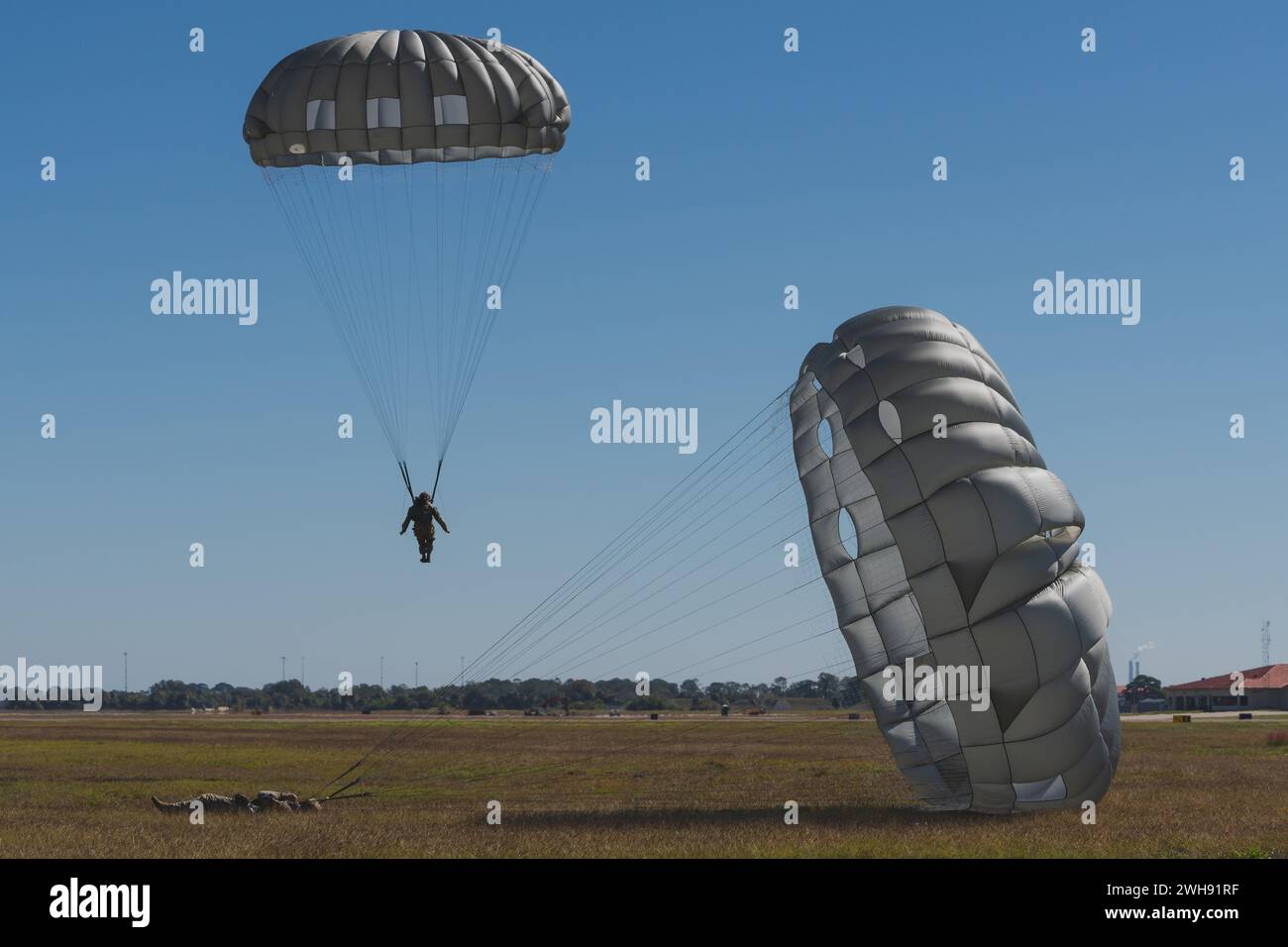 Members assigned to special operations forces descend toward MacDill ...