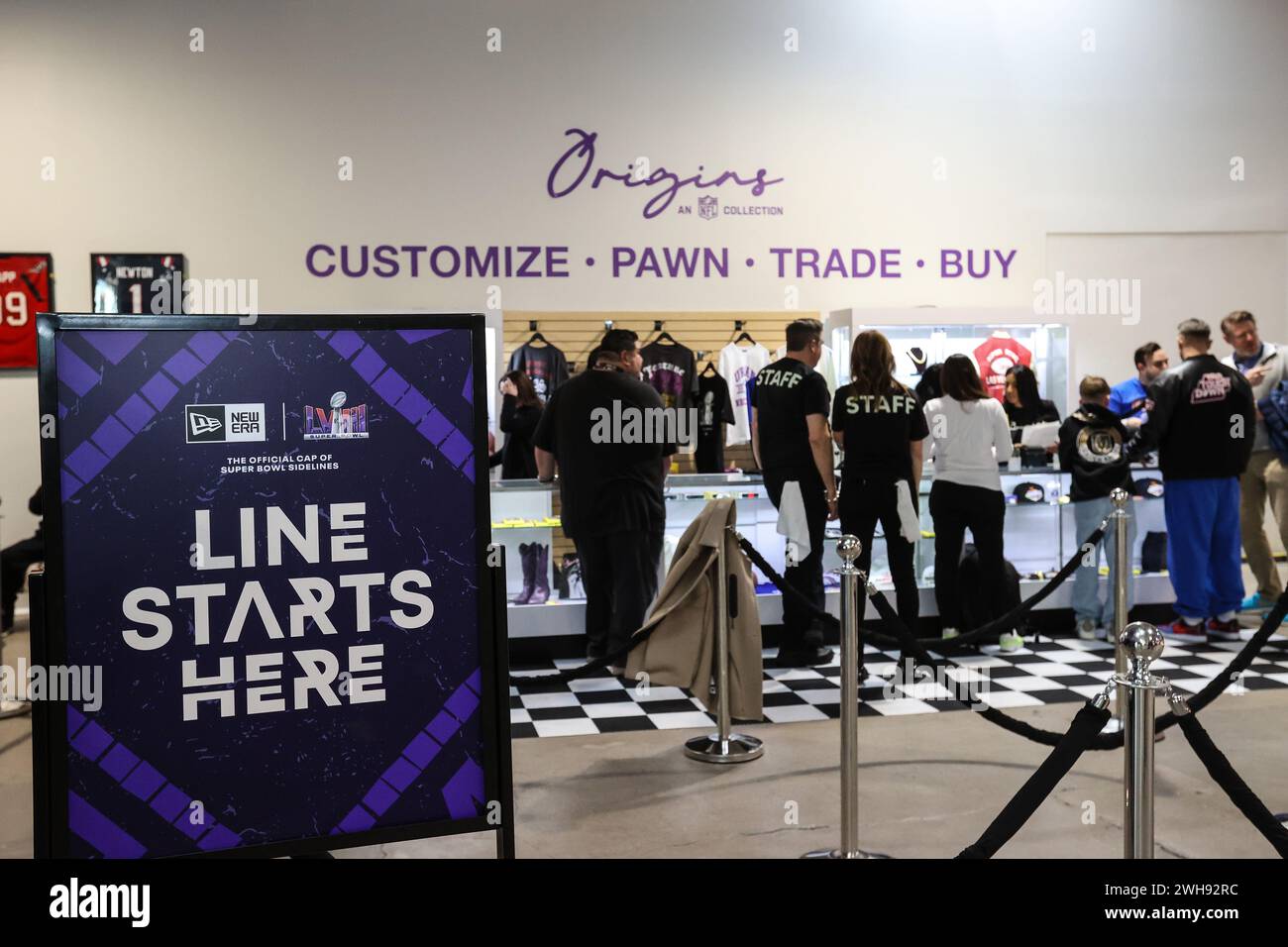 February 08, 2024: Customers wait in line to make their purchases ...