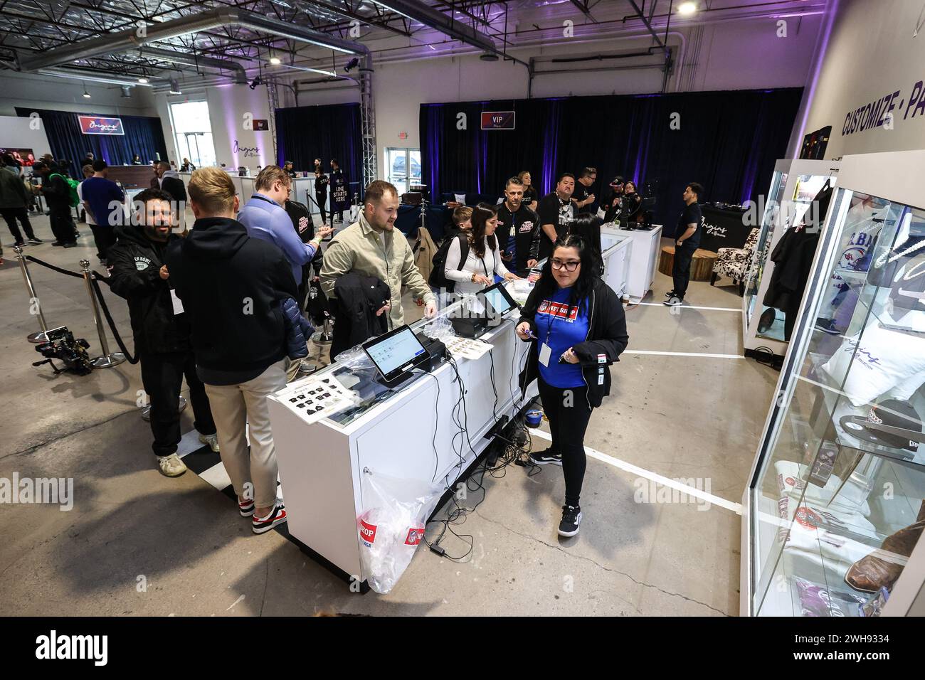 February 08, 2024: Customers wait in line to make their purchases ...