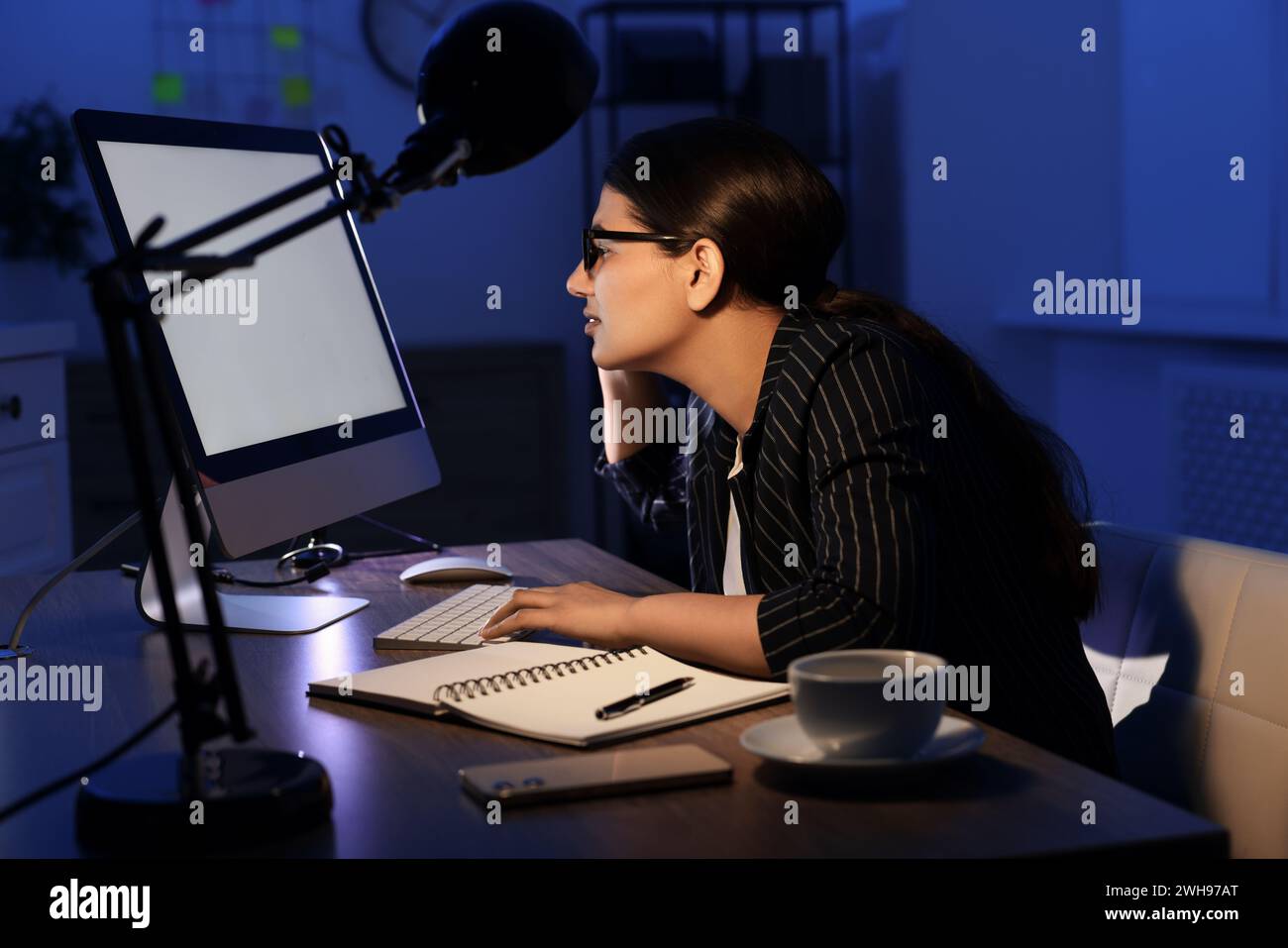 Tired girl working night in hi-res stock photography and images - Alamy