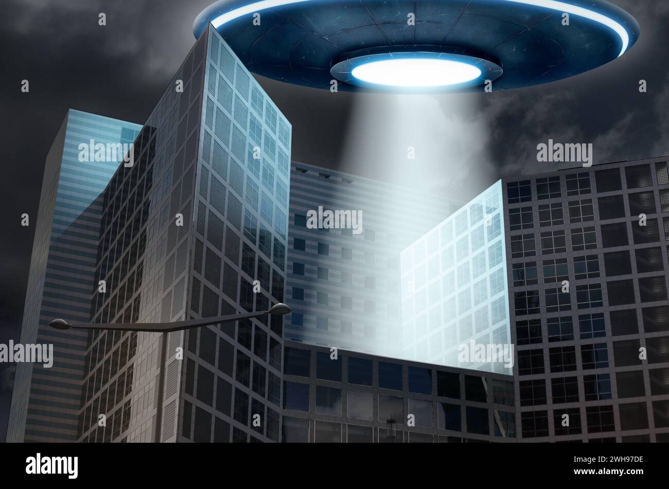 Alien spaceship emitting light over buildings. UFO, extraterrestrial ...