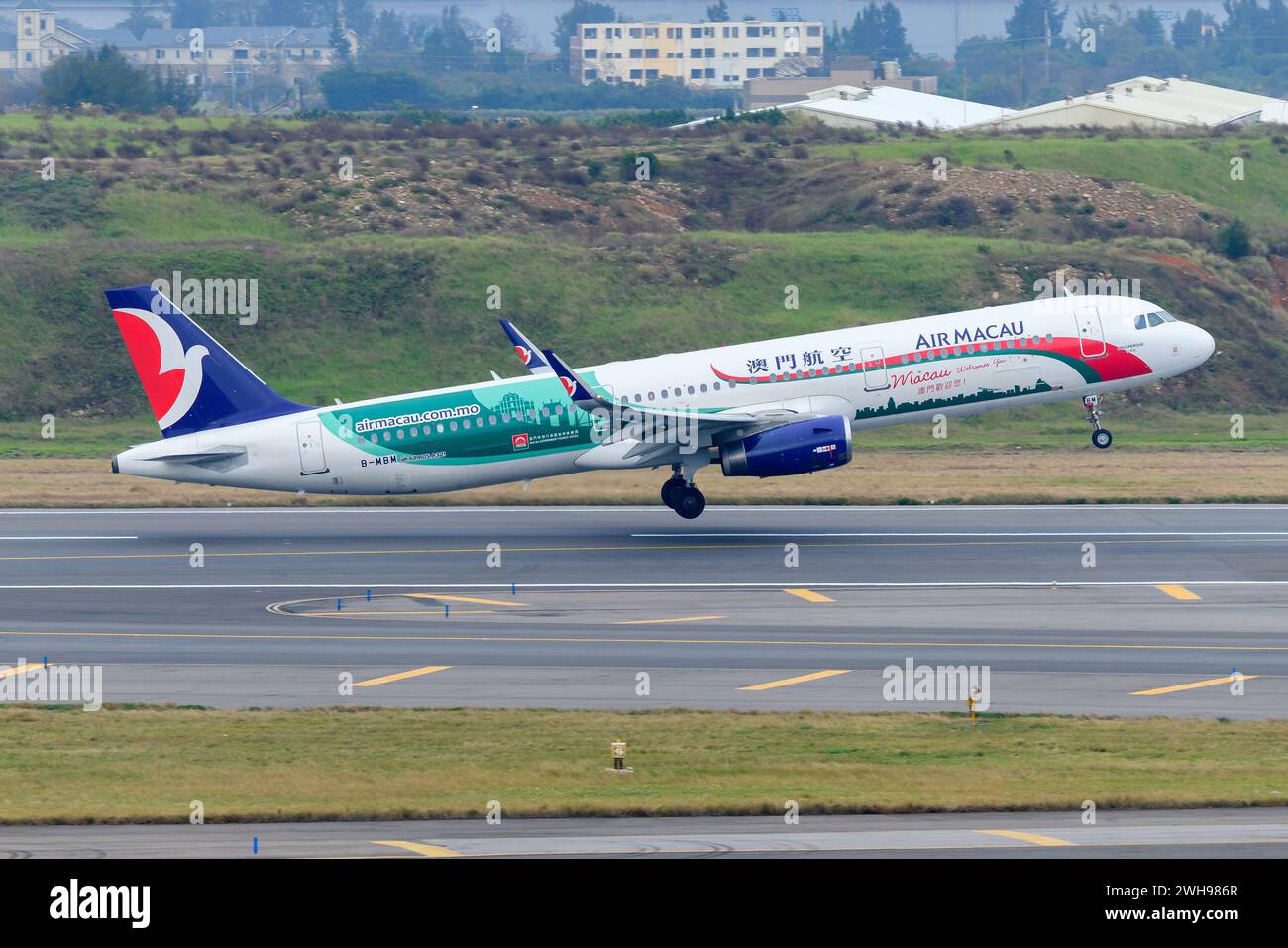 Air Macau Airbus A321 aircraft taking off. Airplane in Air Macau livery ...