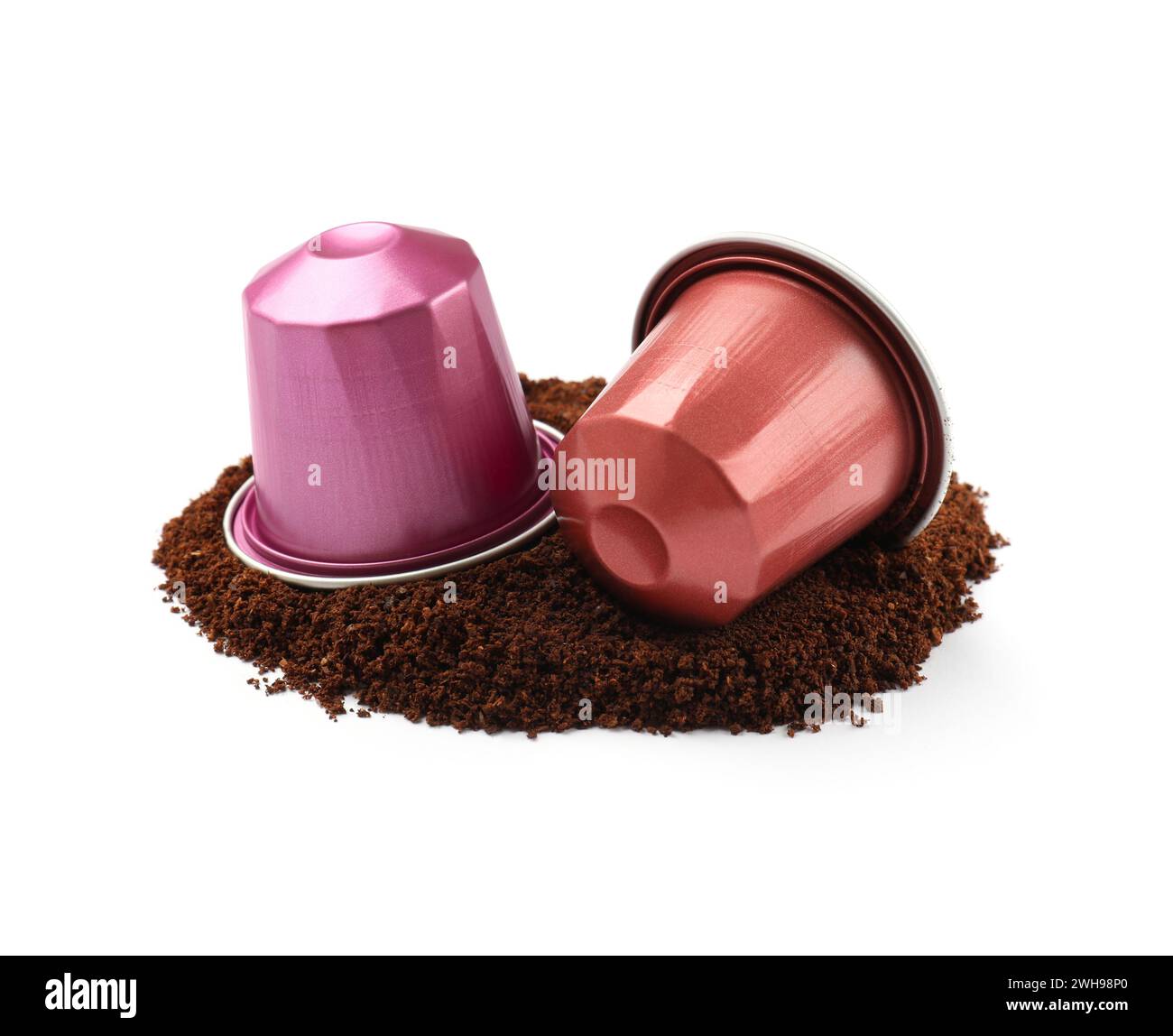 Coffee capsules and powder isolated on white Stock Photo - Alamy