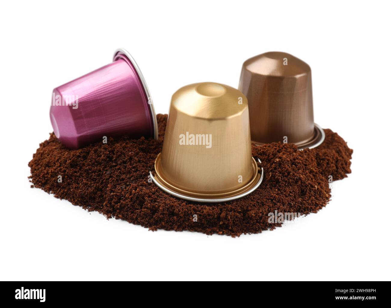 Coffee capsules and powder isolated on white Stock Photo - Alamy