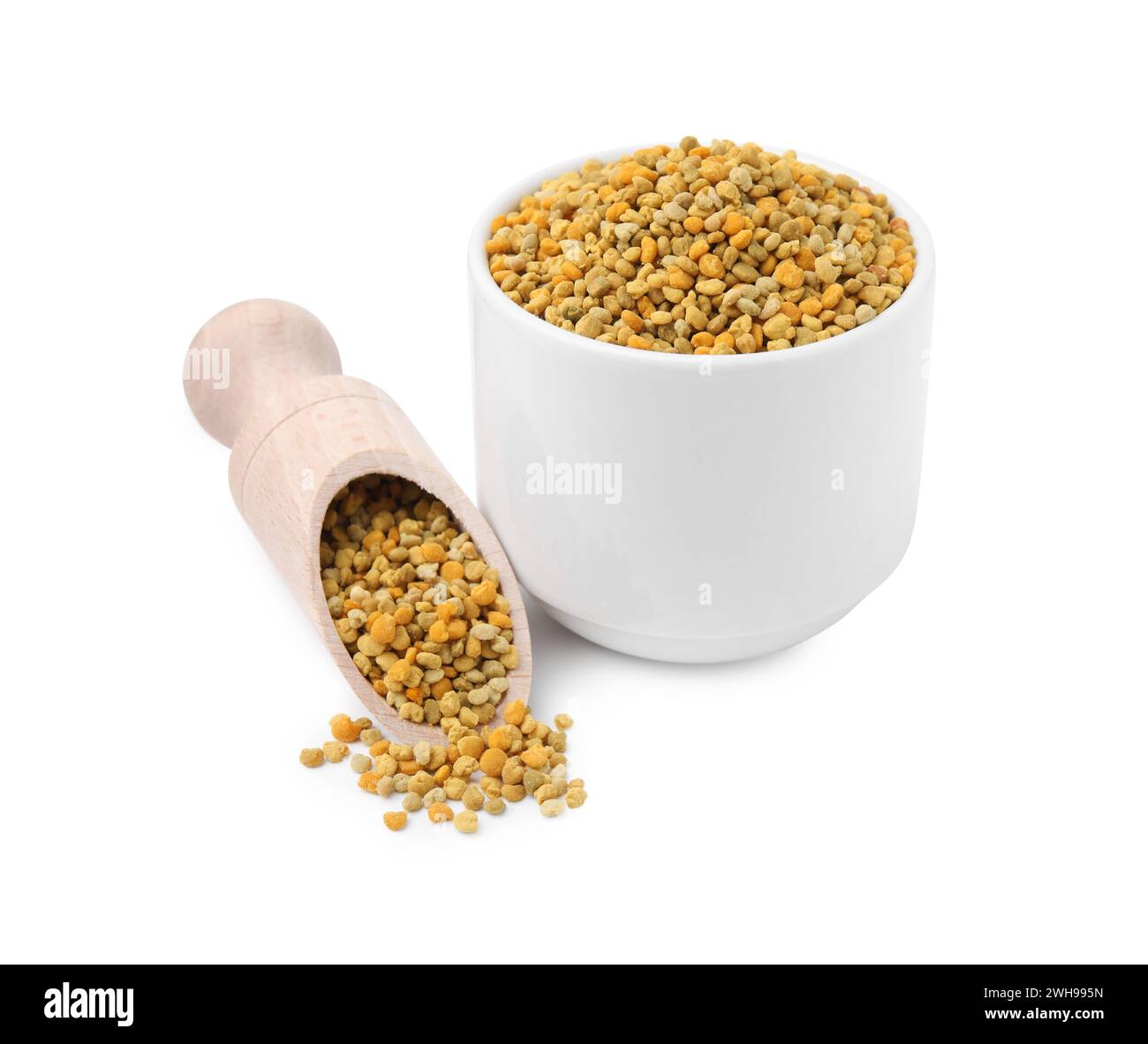 Fresh bee pollen granules isolated on white Stock Photo - Alamy