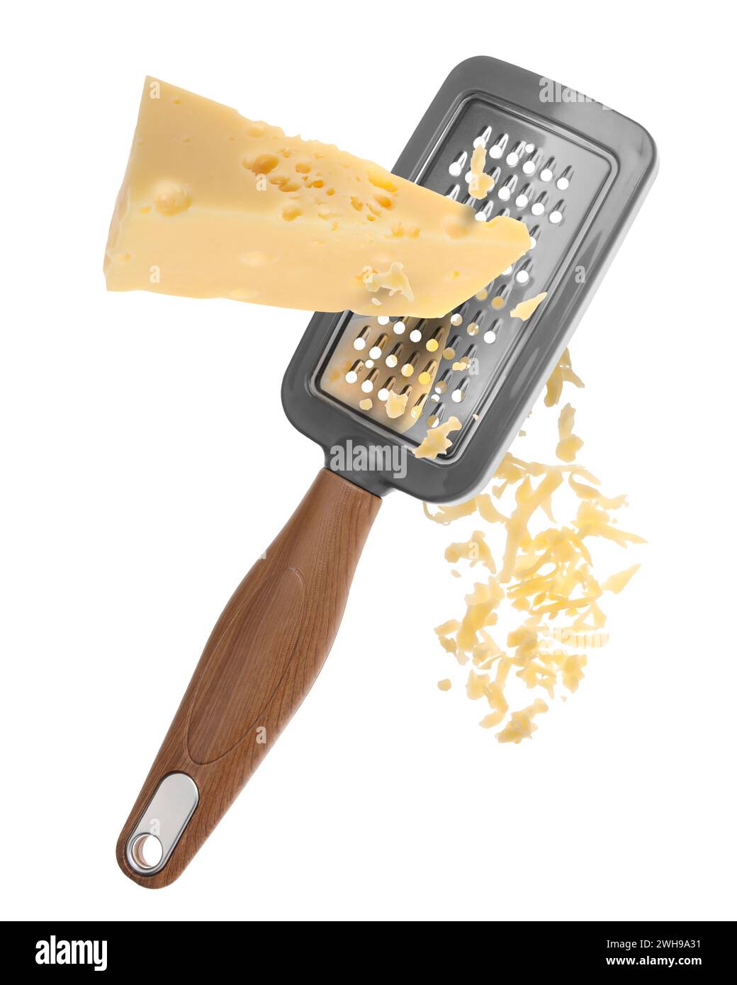 Grating cheese with hand grater in air on white background Stock Photo ...