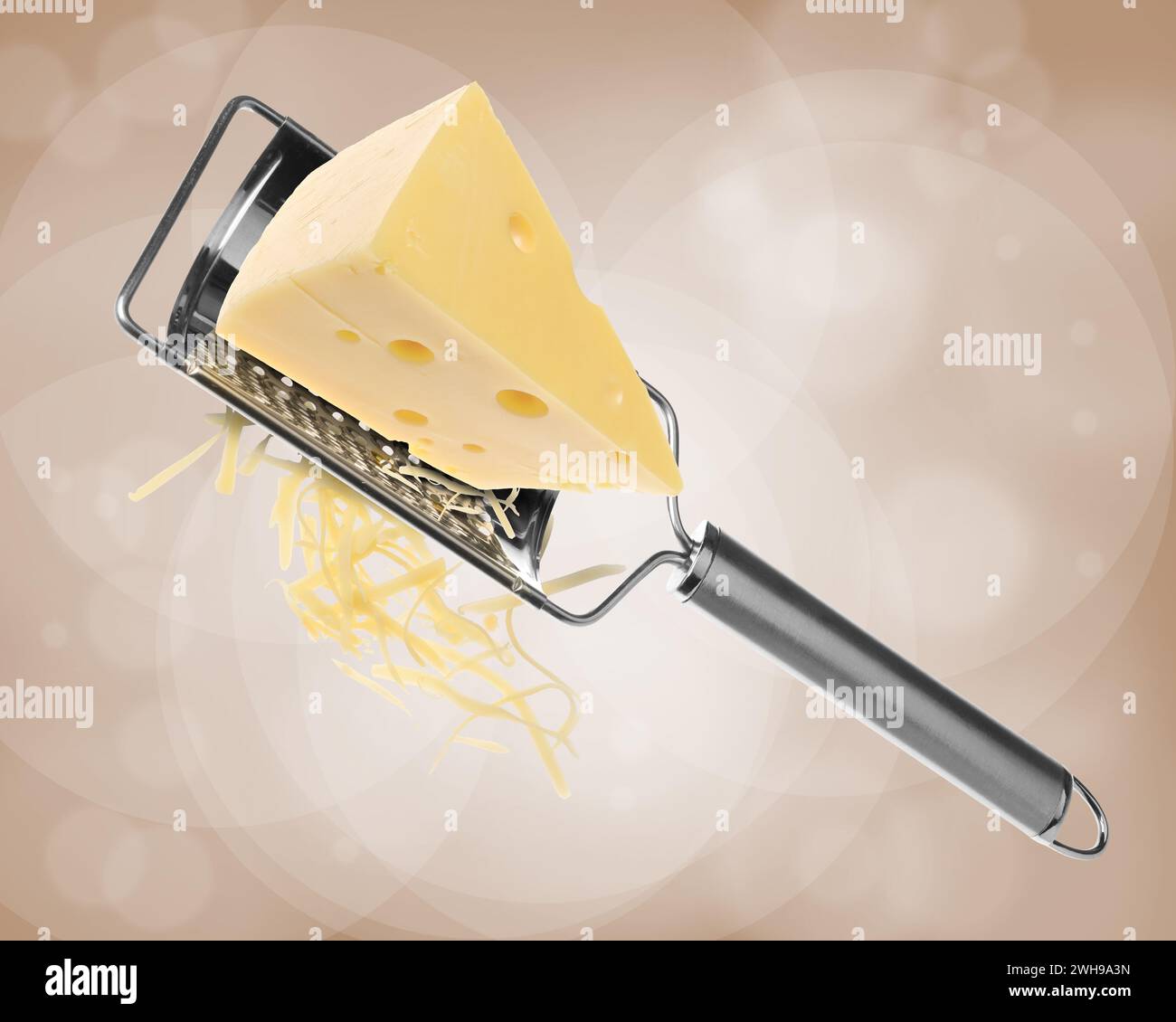 Hand grating yellow cheese metal hi-res stock photography and images ...