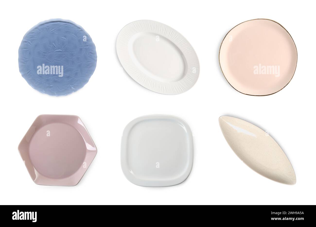 Different clean plates isolated on white, set Stock Photo - Alamy