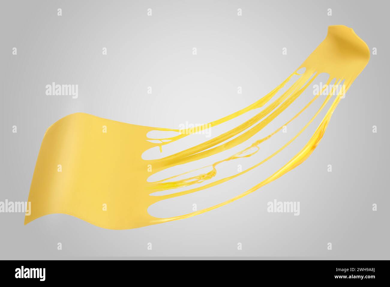 Tasty cheese stretching in air on grey background Stock Photo - Alamy