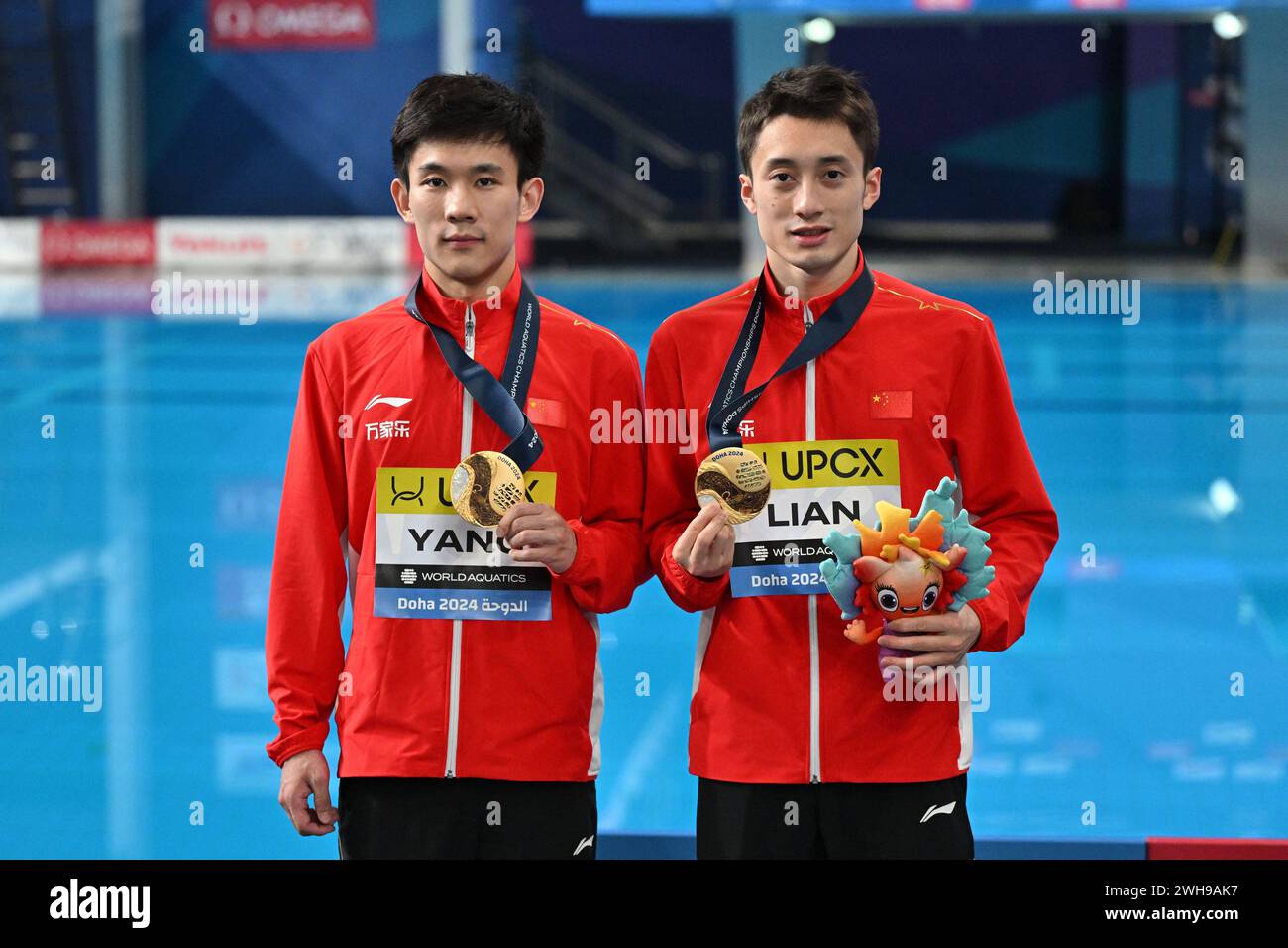 Doha, Qatar. 8th Feb, 2024. Gold medalists Lian Junjie (R)/Yang Hao of China pose after the ...