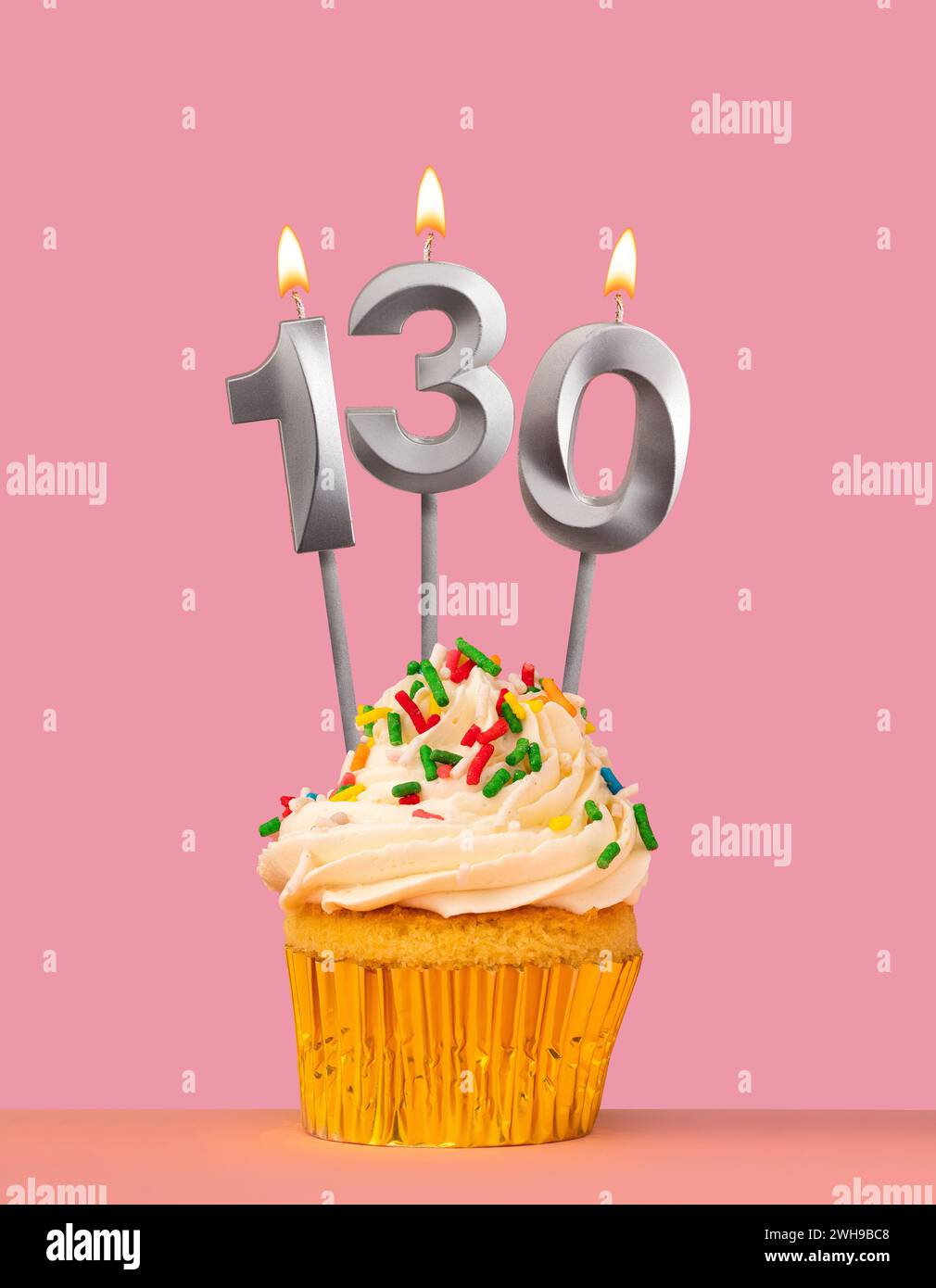 Number 130 candle with cupcake - Birthday card Stock Photo - Alamy