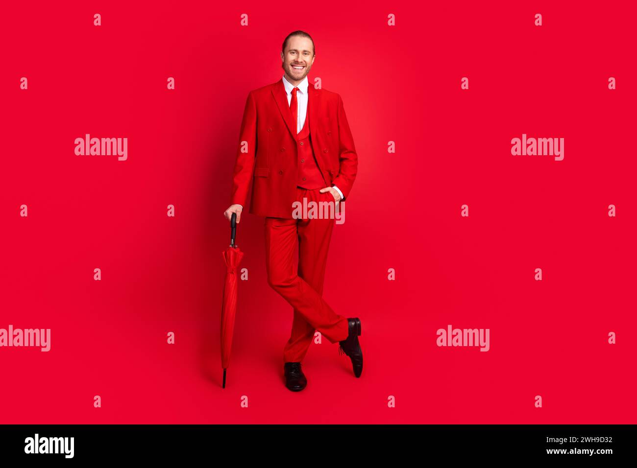 Full body photo of attractive young man posing defile umbrella dressed ...