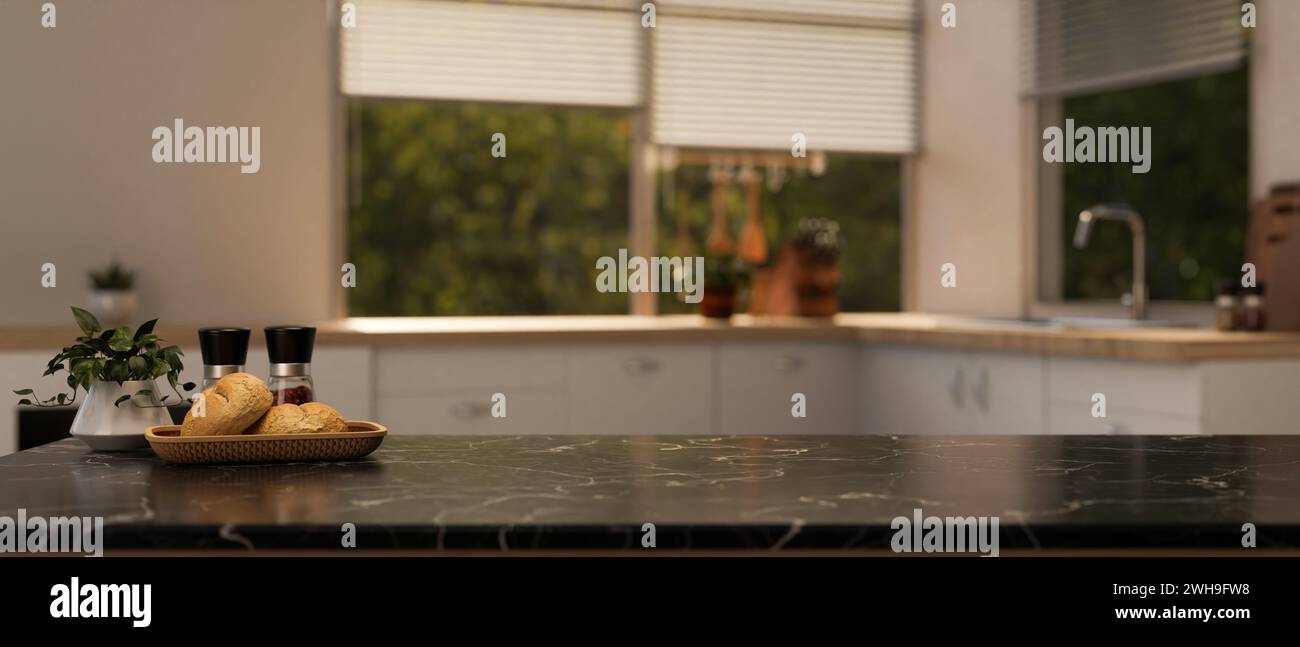 A copy space for display your product on a black marble kitchen island ...