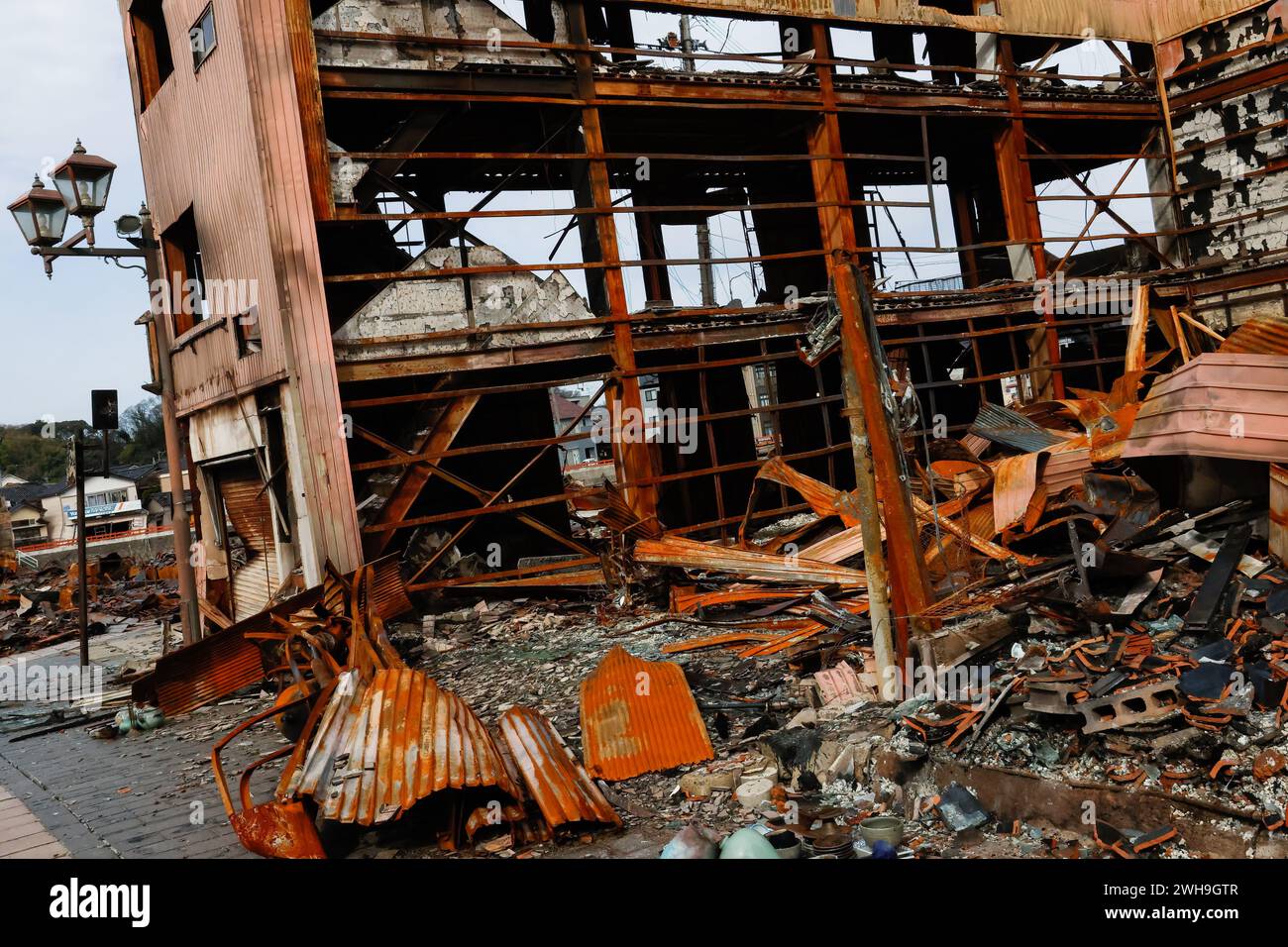 A view of destroyed buildings and debris around the tourist spot ...