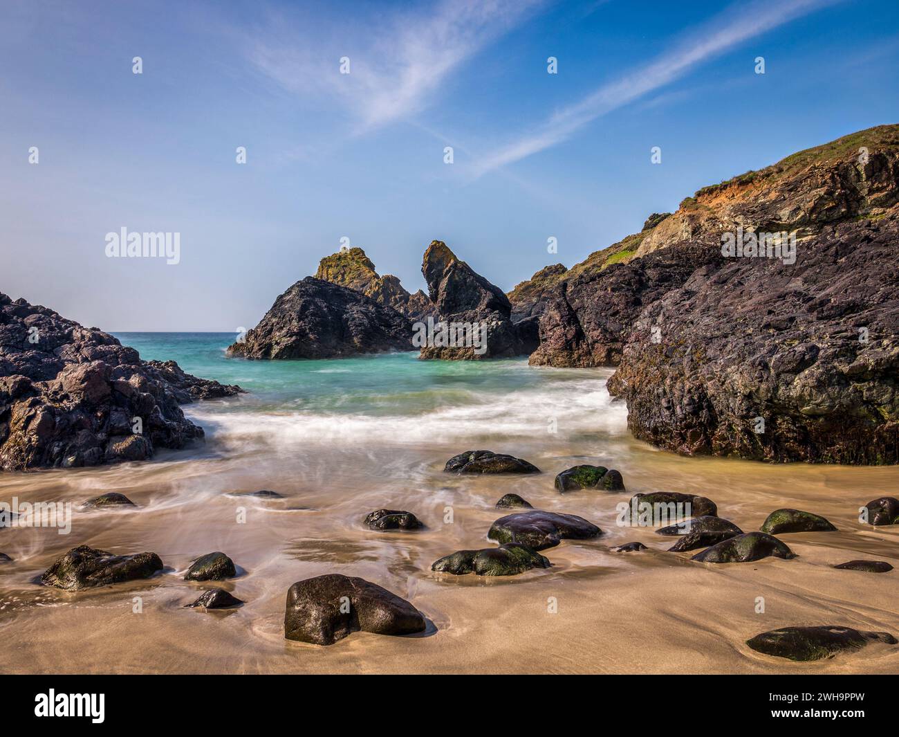 Incoming tide at Kynance Cove, a renowned beauty spot on the Lizard ...