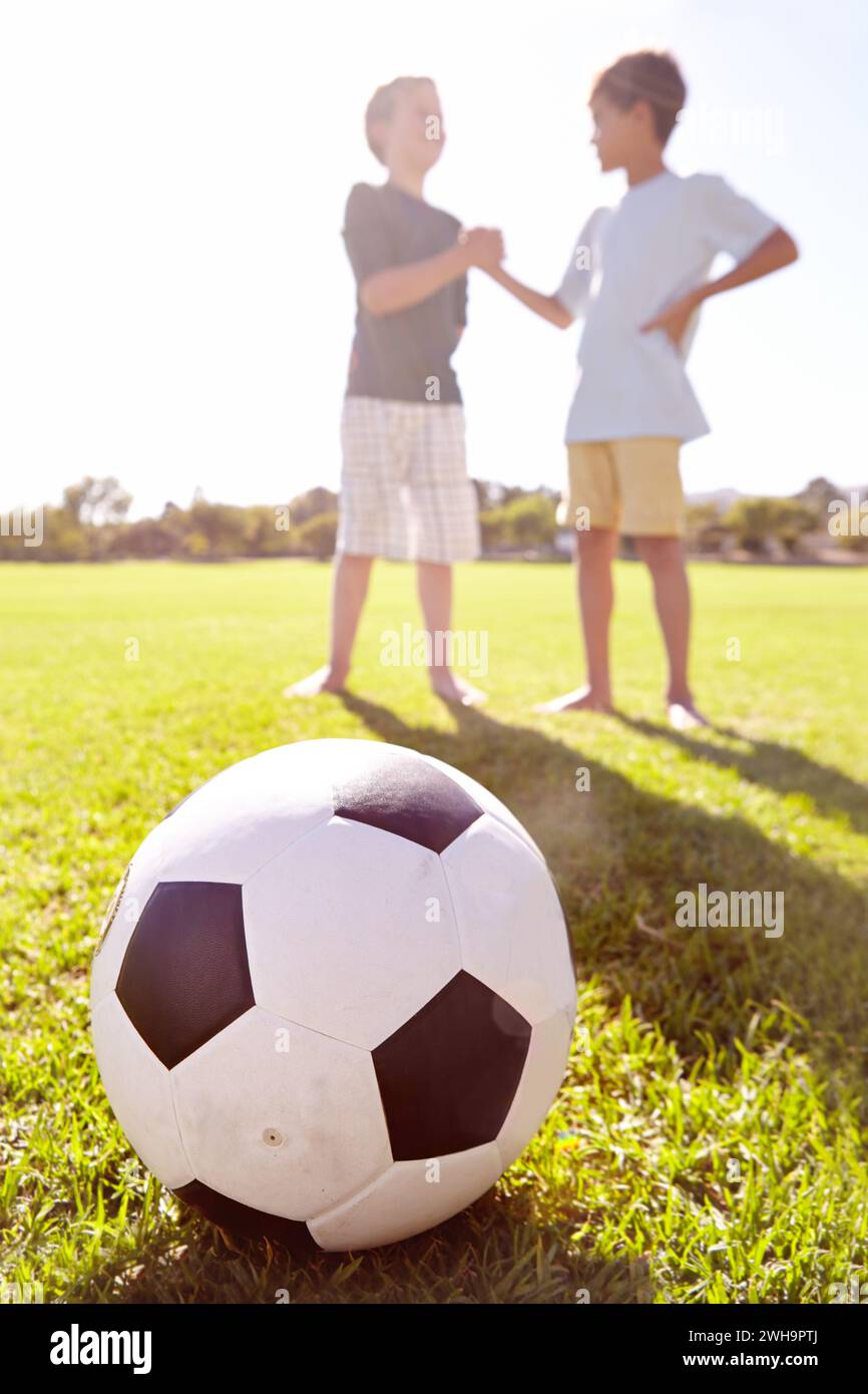 Children soccer ball handshake hi-res stock photography and images - Alamy
