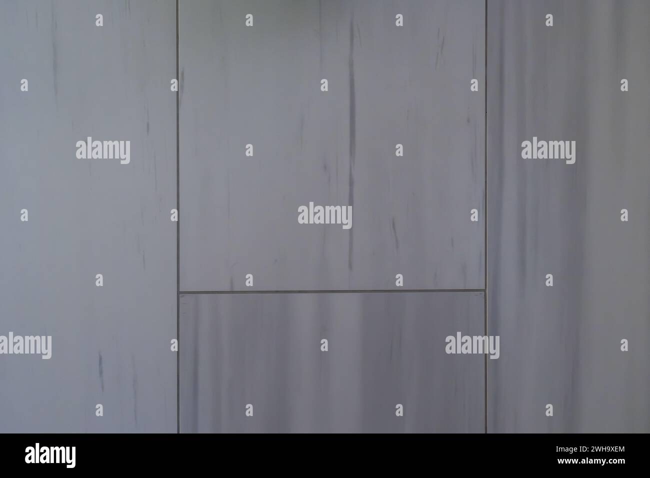 Abstract texture background of a large stone tiled shower wall surface ...