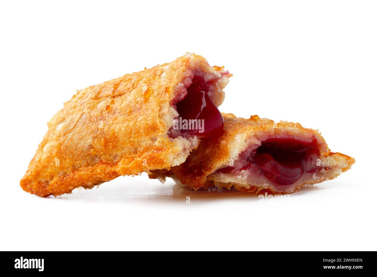 Fried cherry pie isolated on white background Stock Photo - Alamy