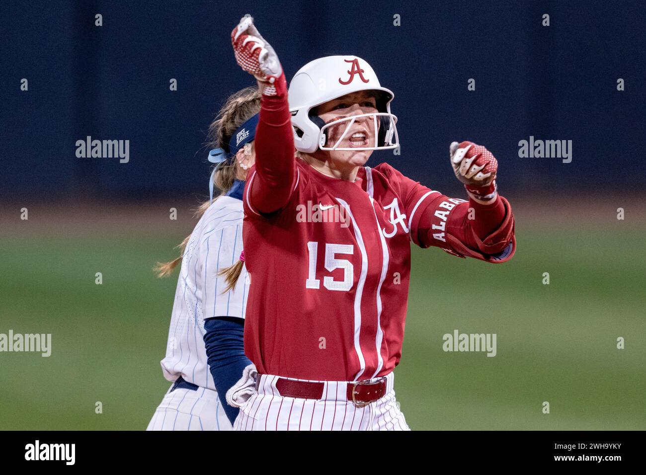 Alabama utility Kendal Clark (15) cheers after getting on 2nd base ...