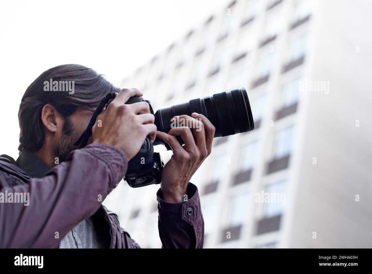 Photographer, work and paparazzi man in city for press, travel and ...