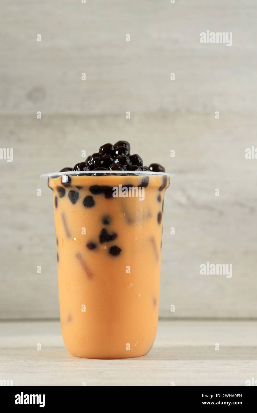 Iced Thai Tea Boba Bubble on Plastic Cup Stock Photo - Alamy