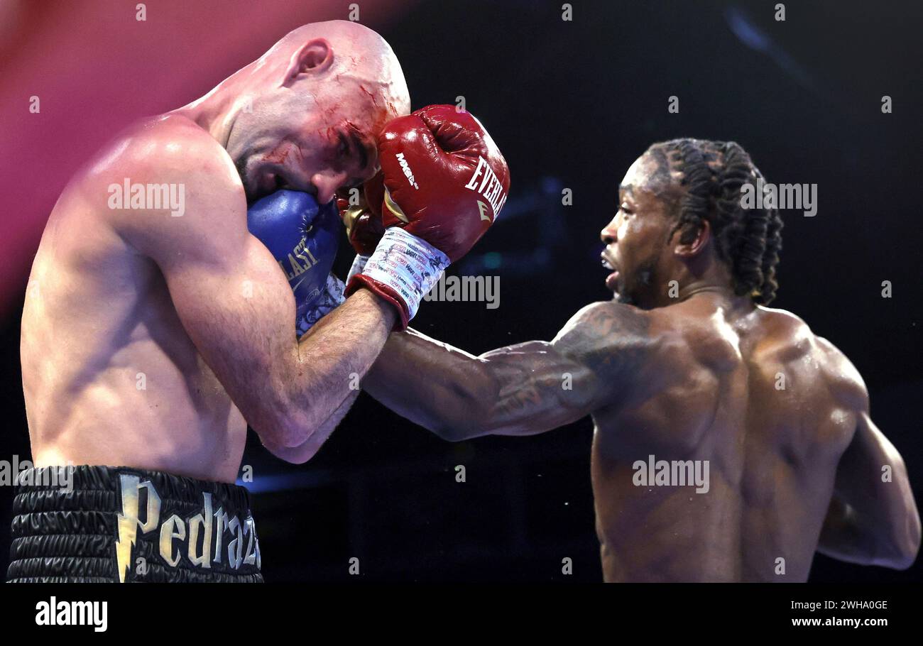 Keyshawn Davis, right, punches Jose Pedraza during a lightweight boxing ...