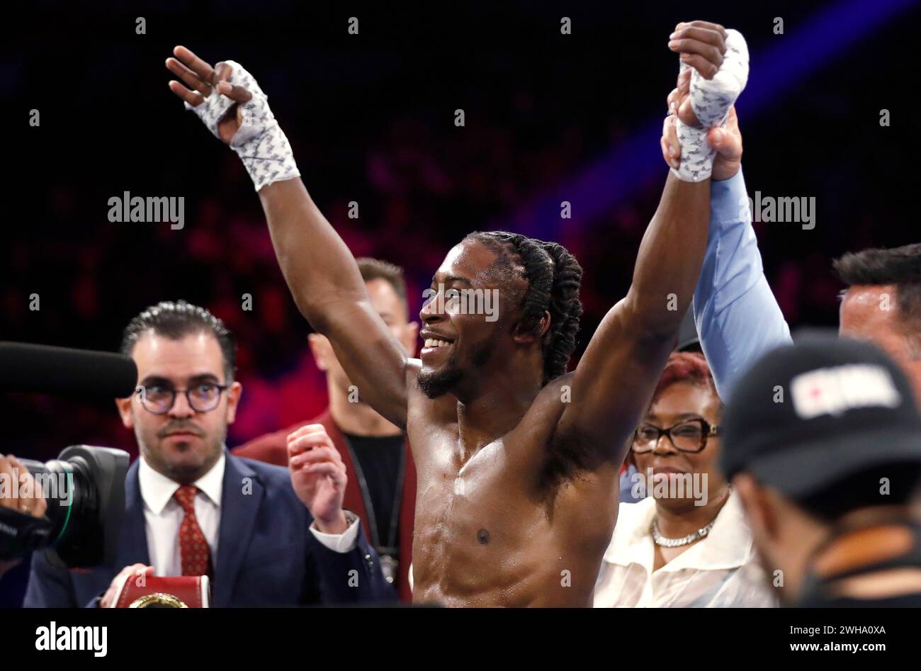 Keyshawn Davis celebrates after being declared the winner over Jose ...