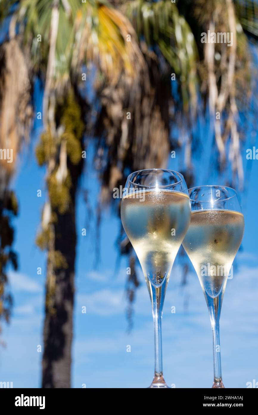 Pouring a glass of champagne on vacation, south of Fuerteventura ...