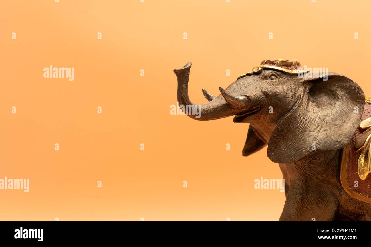 Design World Elephant Day. Bronze Decorated Elephant On Peach Yellow ...