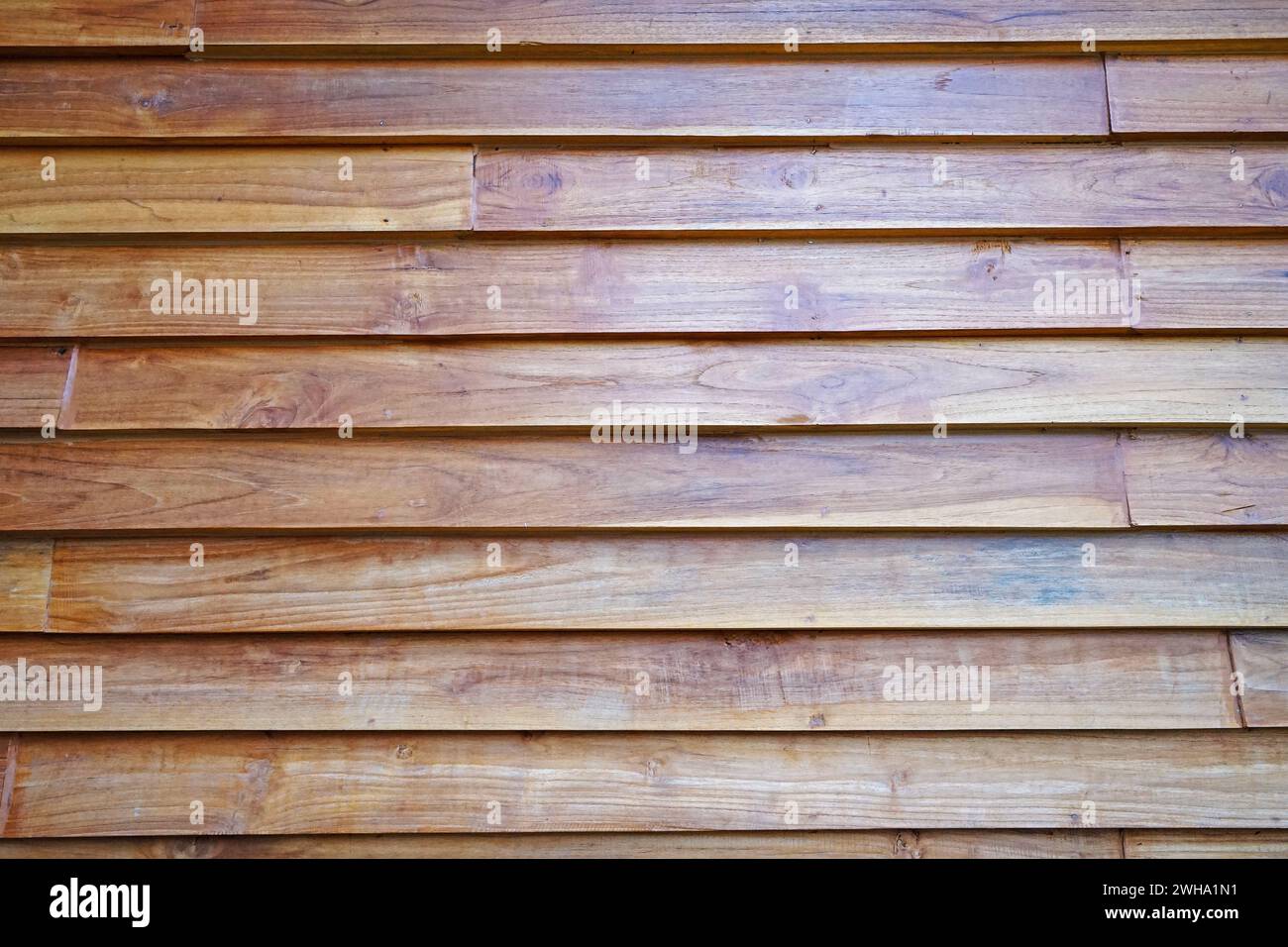 Wooden plank panels texture and doussie cut logs Stock Photo - Alamy