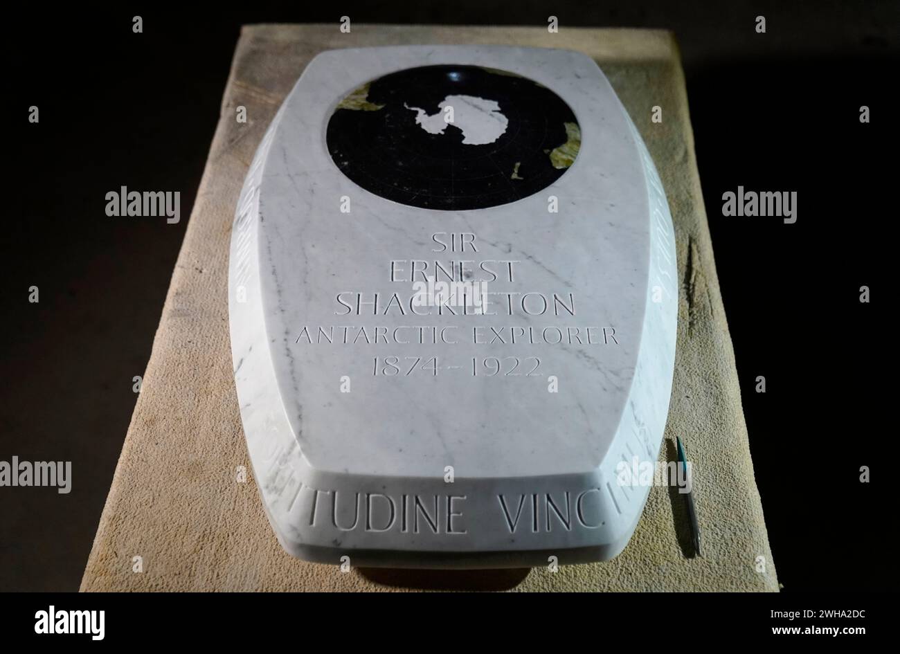 Stonemason Will Davies adds the finishing touches to a memorial stone ...