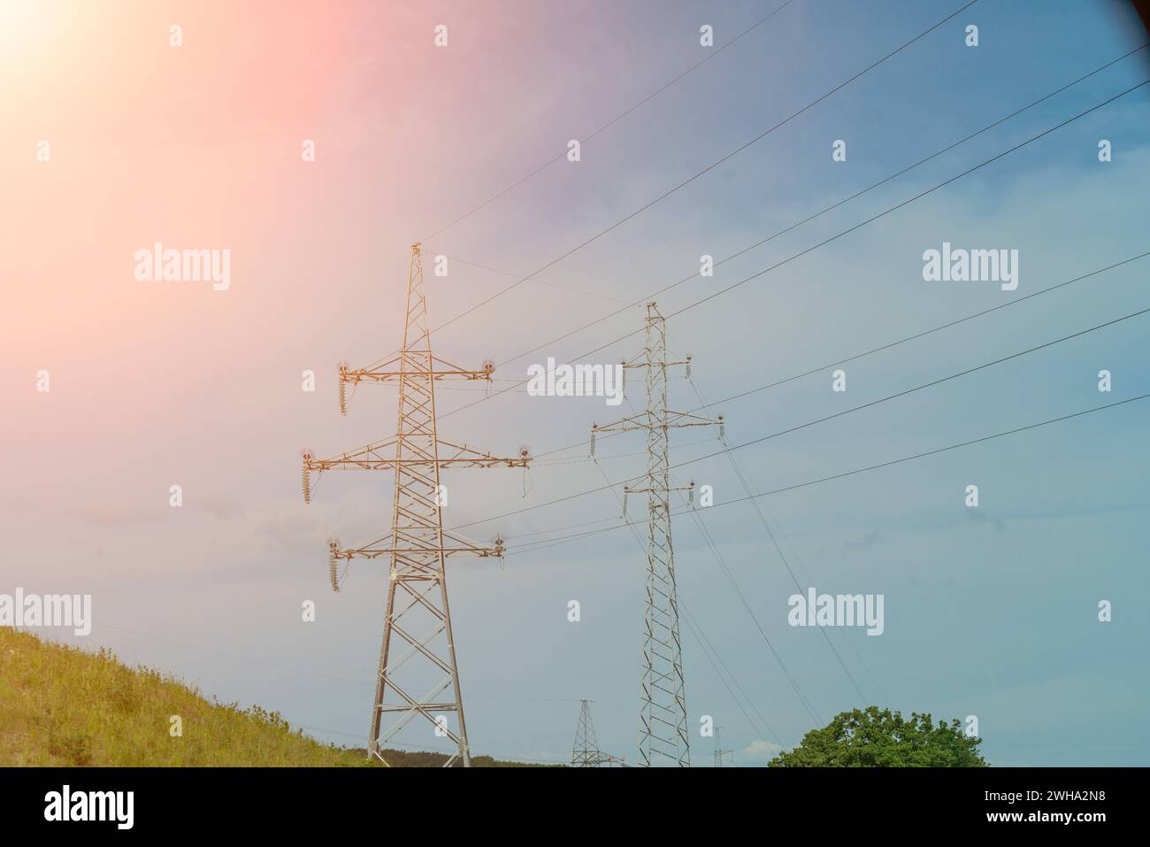 High voltage towers with sky background. Power line support with wires ...