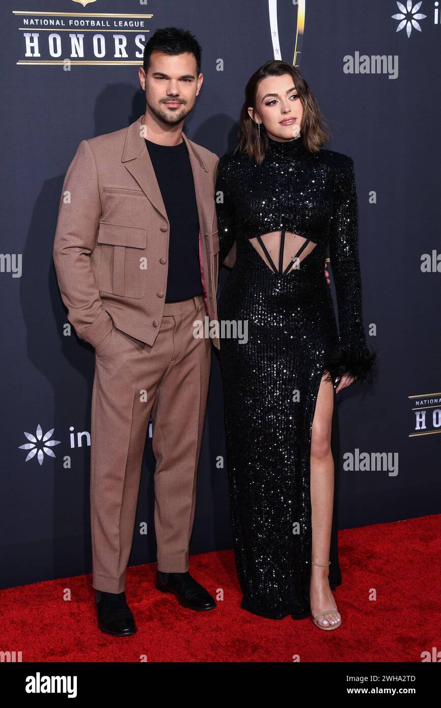 Taylor Lautner and Taylor Dome on the red carpet at the 13th annual NFL ...
