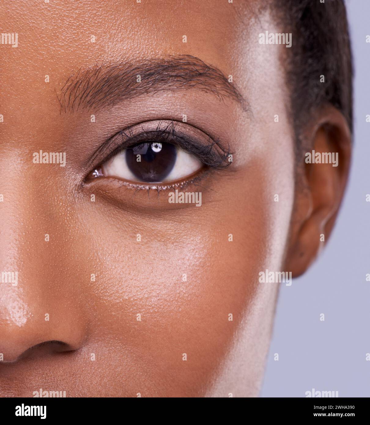 Beauty, skincare and eye of black woman with cosmetics, skin shine and ...