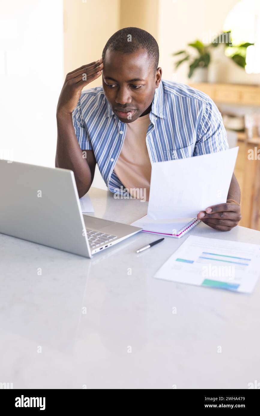 Young man reviews document hi-res stock photography and images - Alamy