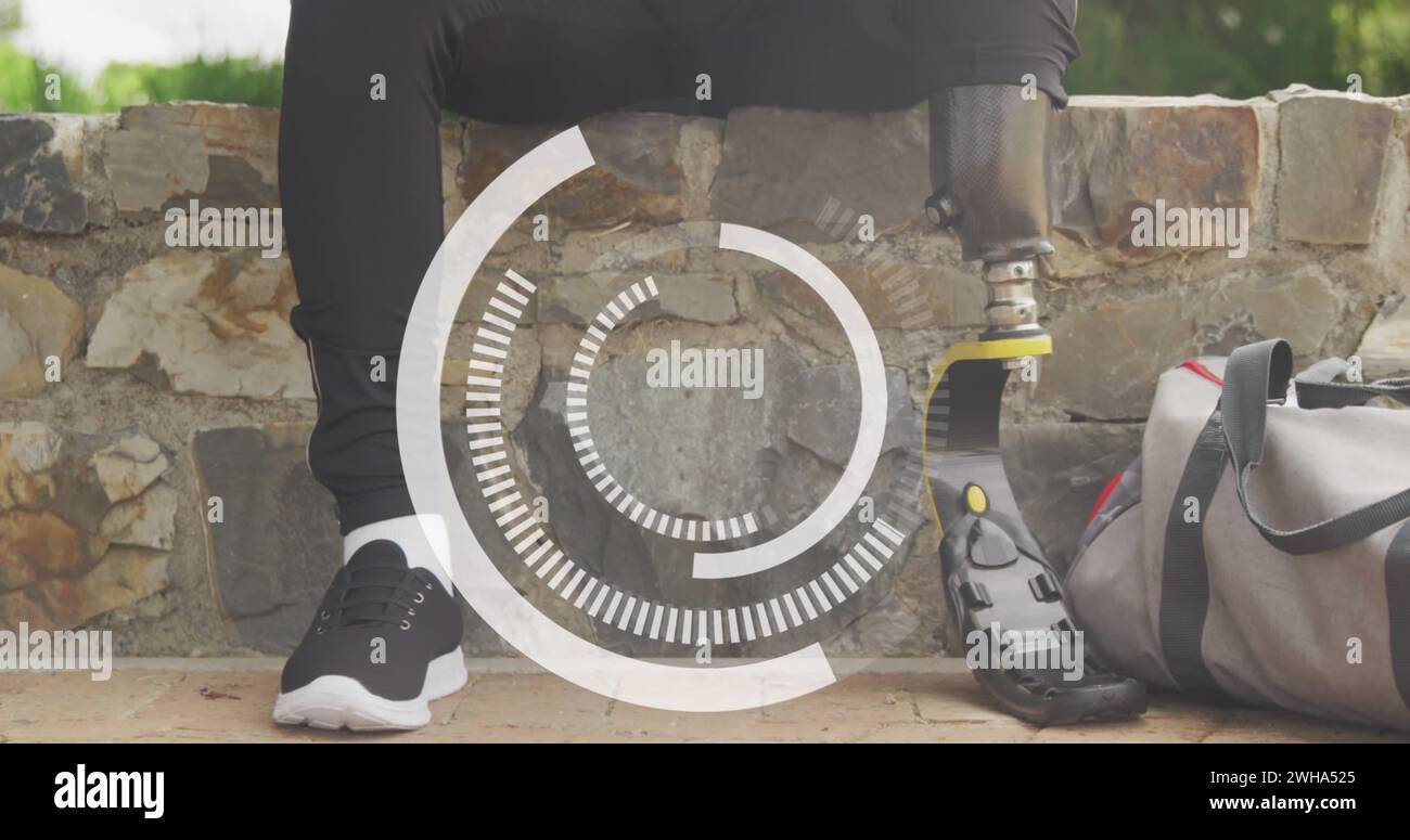 Image of rotating circular scanner over male athlete with prosthetic ...