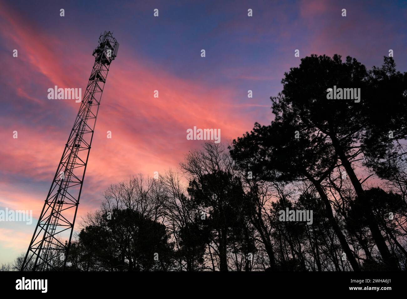 Deployment of the 5G network. Laying antennas on a mobile phone mast in ...