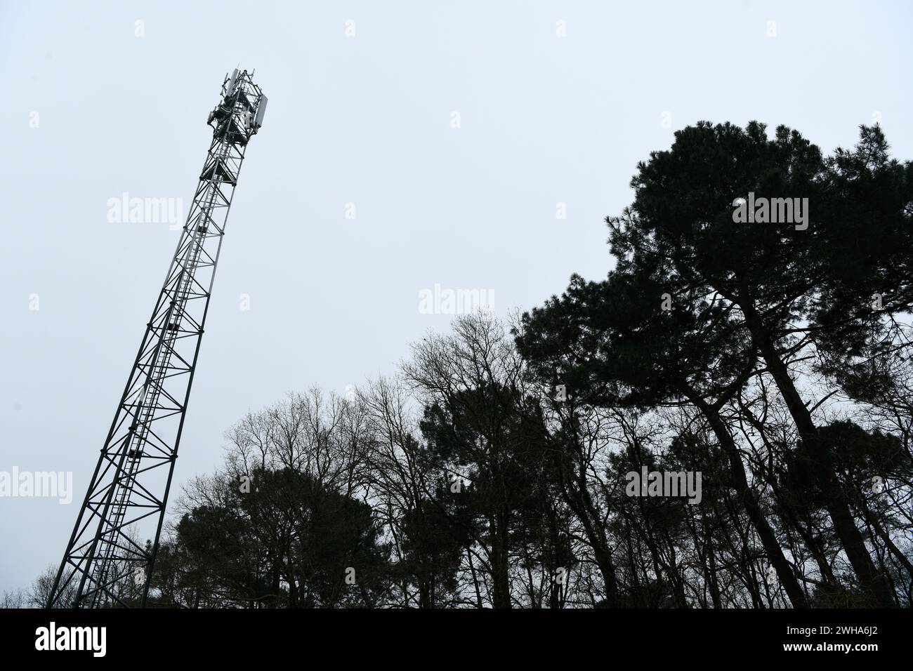 Deployment of the 5G network. Laying antennas on a mobile phone mast in ...