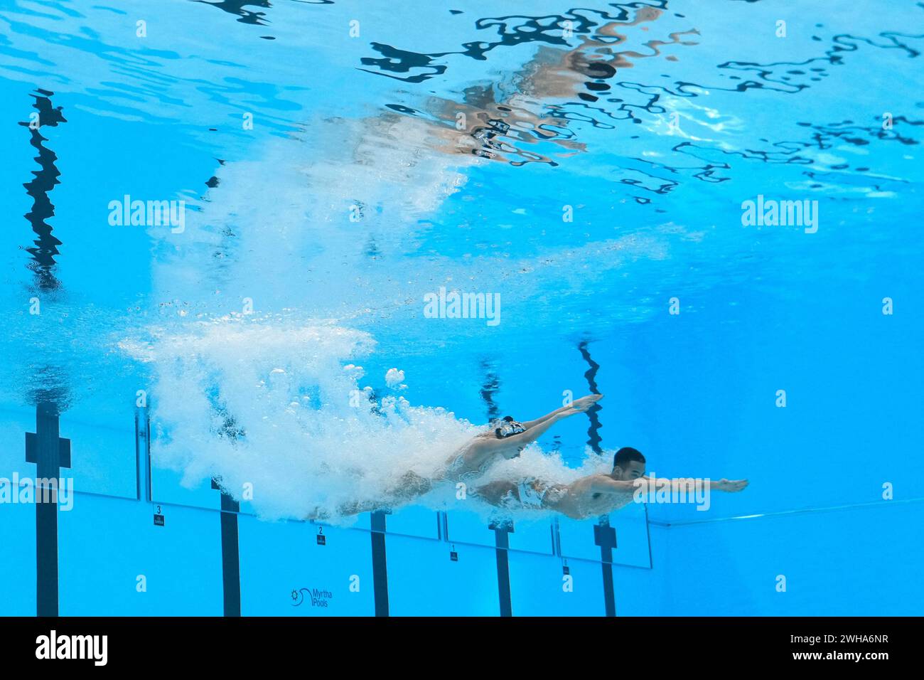 Shi Haoyu and Cheng Wentao, of China, compete in the mixed duet free of ...