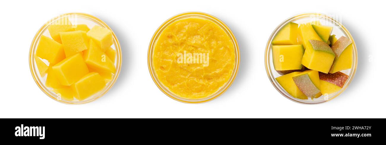 Mango sliced with skin, mashed jam and sweet bites on white background ...