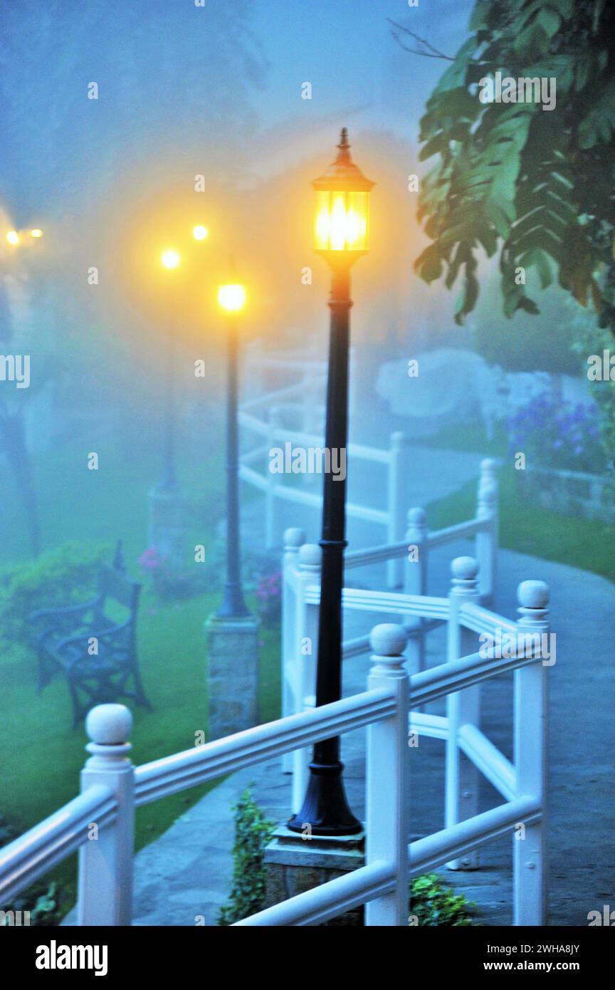 entrance gate lights in mist, Elgin Hotel, Darjeeling, West Bengal ...