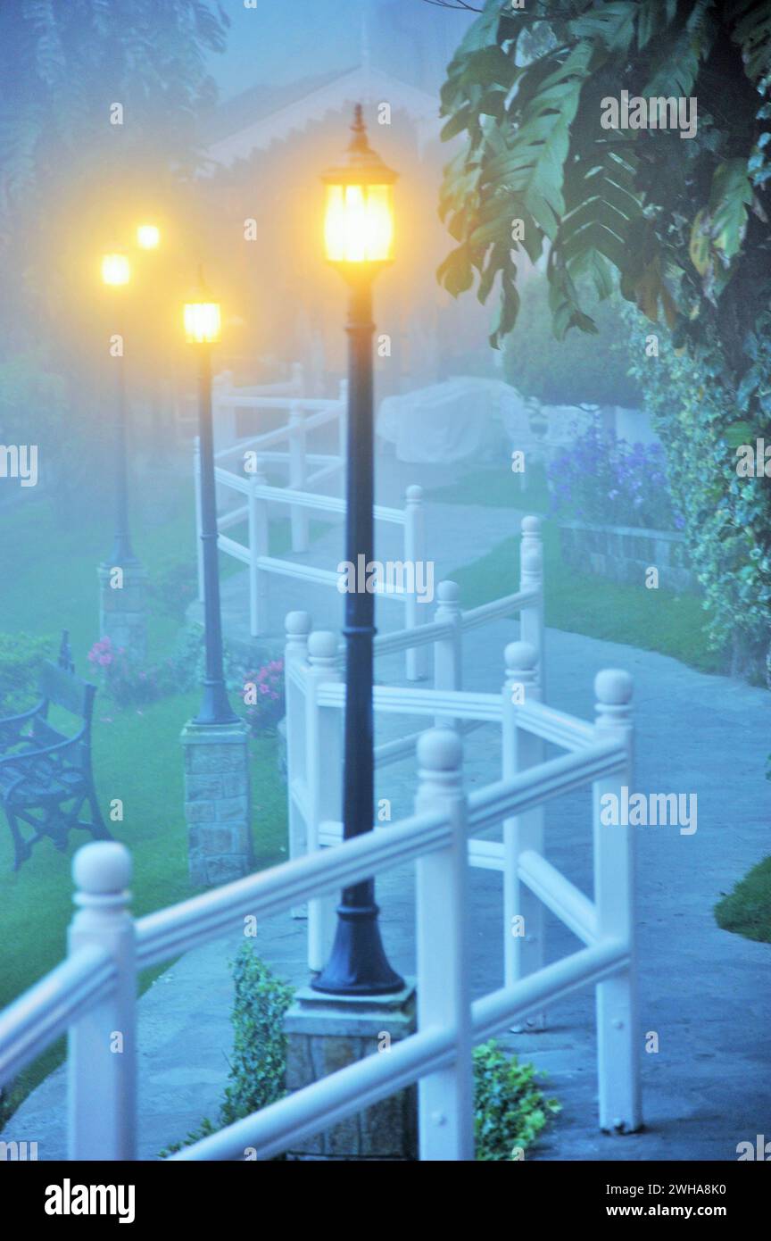 entrance gate lights in mist, Elgin Hotel, Darjeeling, West Bengal ...