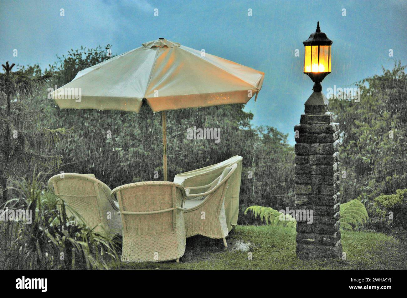 Table and chairs in rain, Elgin Mount Pandim Hotel, Pemayangtse ...
